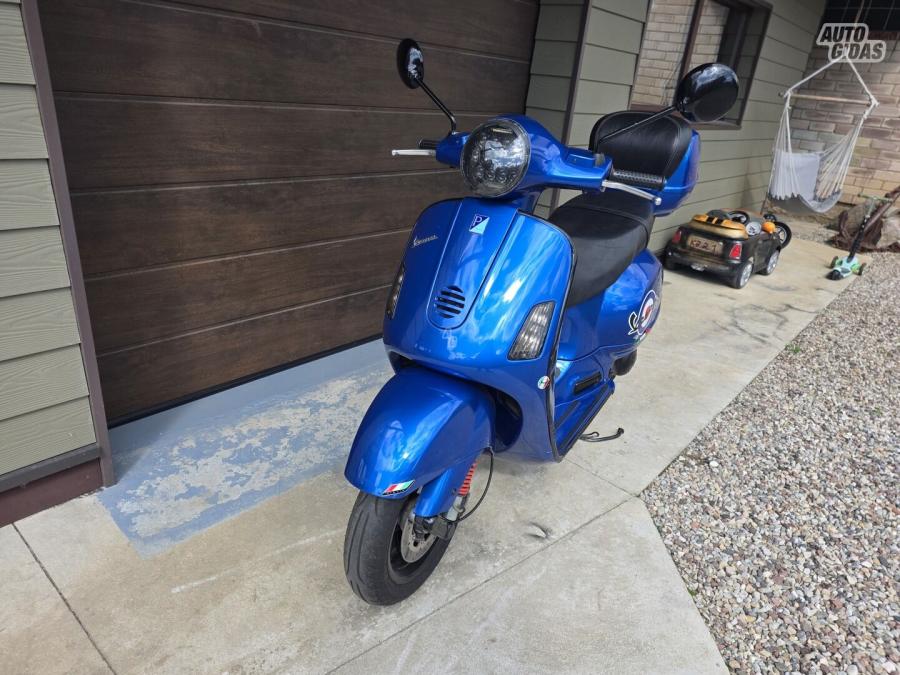 Blue Piaggio Vespa 2006 in Pasvalys, with an engine capacity of 0.13 L and mileage of 41 thousand km for 1499 €, photo 20 on AUTOMOTO.COM.LV