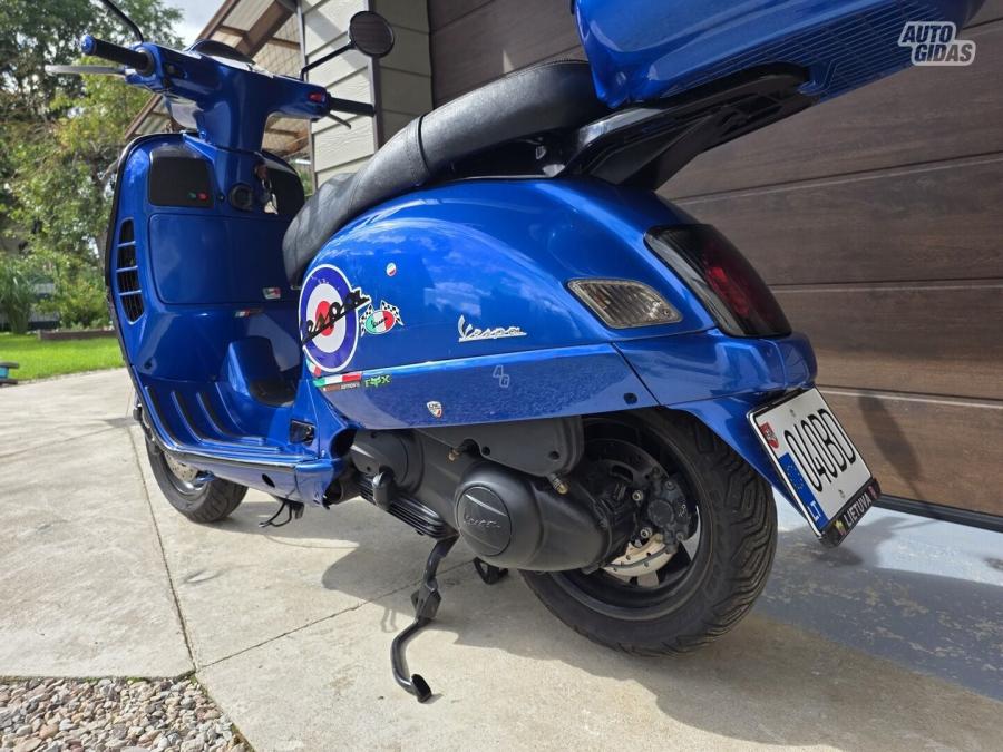 Blue Piaggio Vespa 2006 in Pasvalys, with an engine capacity of 0.13 L and mileage of 41 thousand km for 1499 €, photo 22 on AUTOMOTO.COM.LV