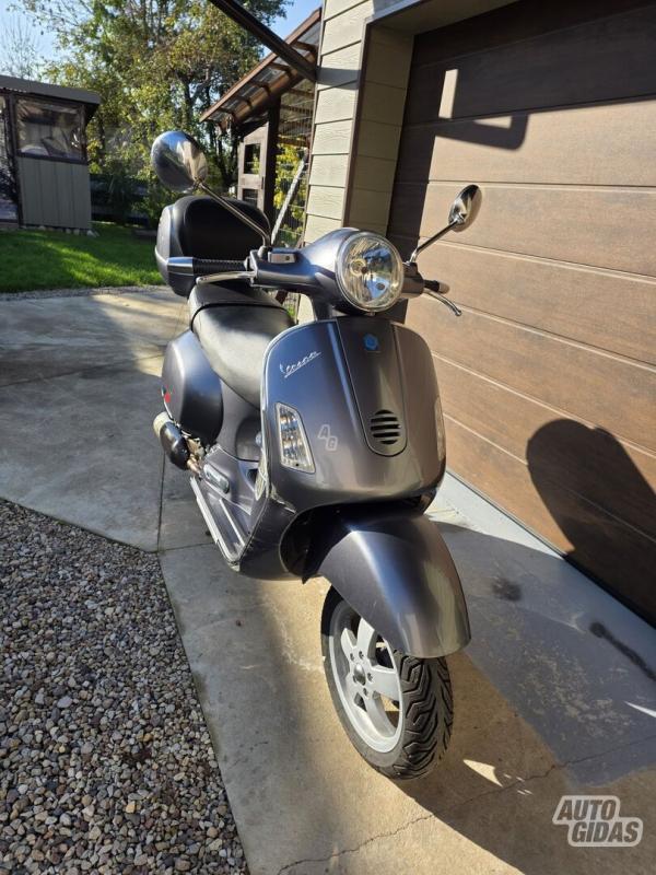 Pelēks Piaggio Vespa 2004 Pasvalys, ar dzinēja tilpumu 0.13 L un nobraukumu 30 tūkst. km par 1299 €, foto 7 vietnē AUTOMOTO.COM.LV