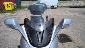 Grey Piaggio X9 2006 in Alytus, with an engine capacity of 0.13 L and mileage of 10 thousand km for 1350 €, photo 15 on AUTOMOTO.COM.LV