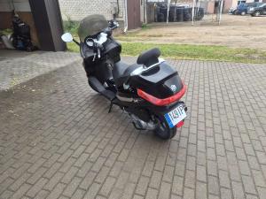 Black Piaggio Xevo 2010 in Taurage, with an engine capacity of 0.13 L and mileage of 9 thousand km for 1100 €, photo  on AUTOMOTO.COM.LV