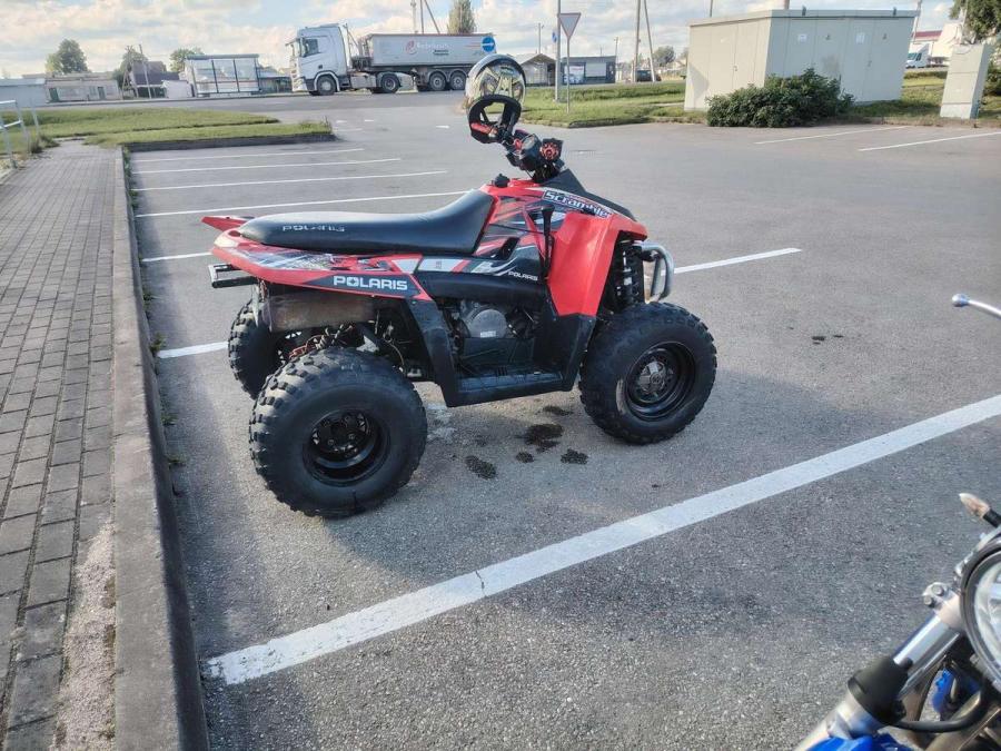 Red Polaris Scrambler 2012 in Taurage, with an engine capacity of 0.50 L and mileage of 6 thousand km for 3200 €, photo 4 on AUTOMOTO.COM.LV