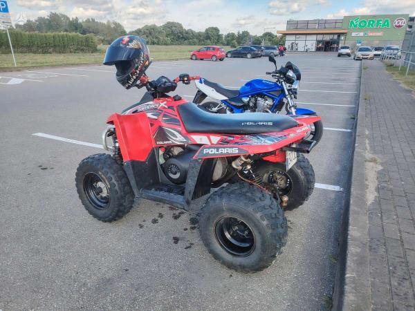 Красный Полярис Scrambler 2012 в Таураге, объемом двигателя 0.50 л и пробегом 6 тыс. км за 3200 €, фото 5 на AUTOMOTO.COM.LV