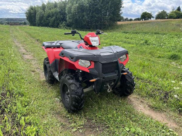 Red Polaris Sportsman 2013 in Kaunas, with an engine capacity of 0.50 L and mileage of 2 thousand km for 3200 €, photo 1 on AUTOMOTO.COM.LV
