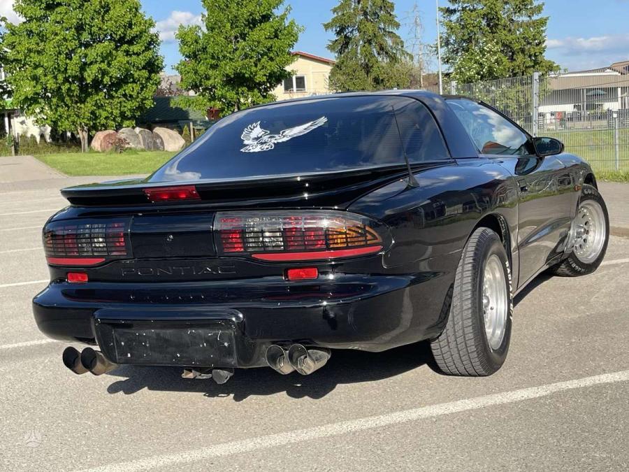 Melns Pontiac Firebird 1994 Viļņa, ar dzinēja tilpumu 3.35 L un nobraukumu 238 tūkst. km par 6299 €, foto 10 vietnē AUTOMOTO.COM.LV