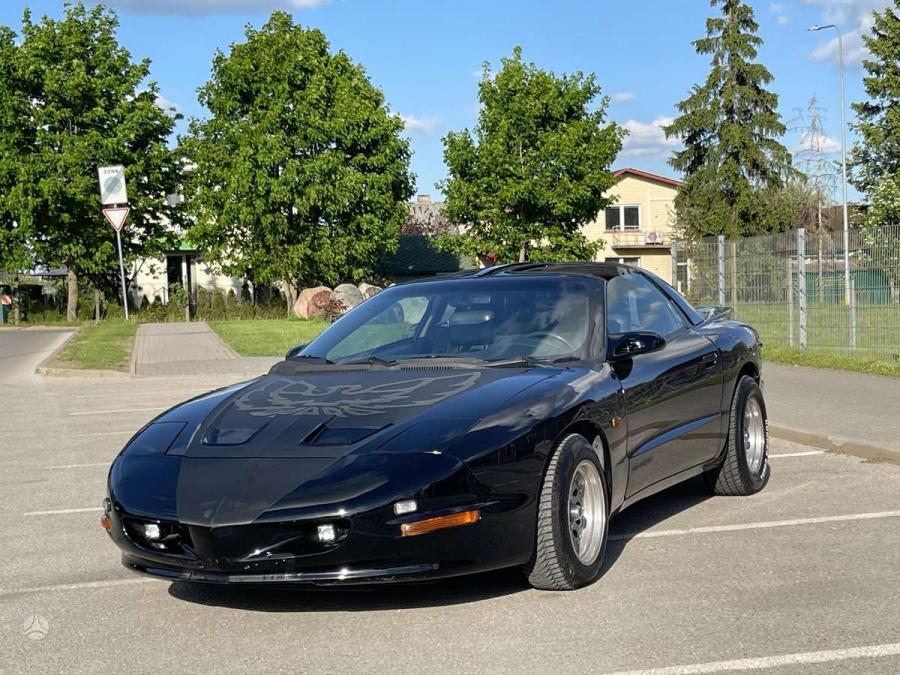 Melns Pontiac Firebird 1994 Viļņa, ar dzinēja tilpumu 3.35 L un nobraukumu 238 tūkst. km par 6299 €, foto 15 vietnē AUTOMOTO.COM.LV