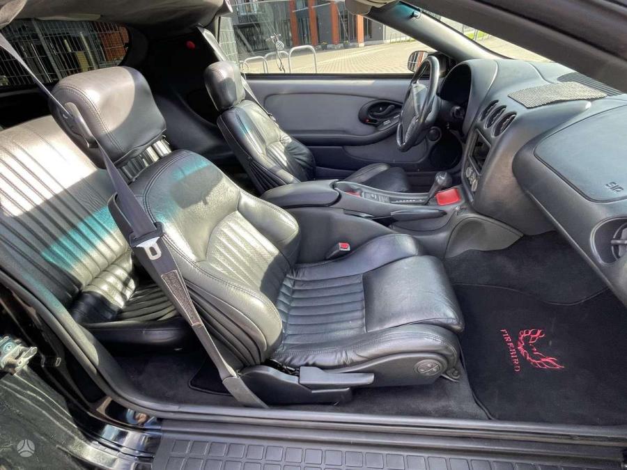 Melns Pontiac Firebird 1994 Viļņa, ar dzinēja tilpumu 3.35 L un nobraukumu 238 tūkst. km par 6299 €, foto 30 vietnē AUTOMOTO.COM.LV