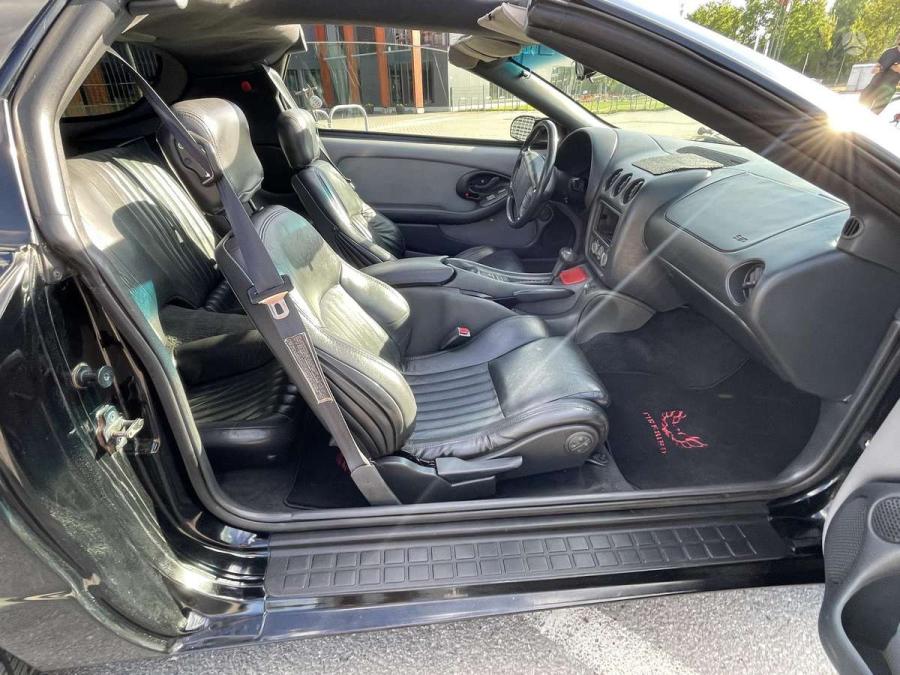 Melns Pontiac Firebird 1994 Viļņa, ar dzinēja tilpumu 3.35 L un nobraukumu 238 tūkst. km par 6299 €, foto 31 vietnē AUTOMOTO.COM.LV