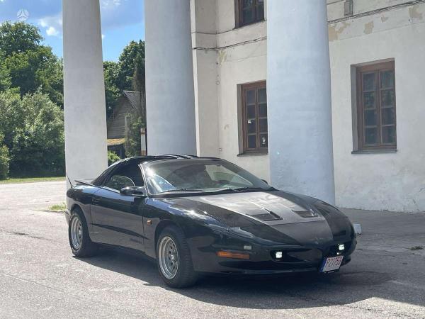 Melns Pontiac Firebird 1994 Viļņa, ar dzinēja tilpumu 3.35 L un nobraukumu 235 tūkst. km par 6299 €, foto 8 vietnē AUTOMOTO.COM.LV