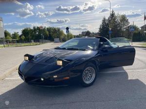 Melns Pontiac Firebird 1994 Viļņa, ar dzinēja tilpumu 3.35 L un nobraukumu 235 tūkst. km par 6299 €, foto 6 vietnē AUTOMOTO.COM.LV