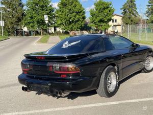 Melns Pontiac Firebird 1994 Viļņa, ar dzinēja tilpumu 3.35 L un nobraukumu 235 tūkst. km par 6299 €, foto 8 vietnē AUTOMOTO.COM.LV