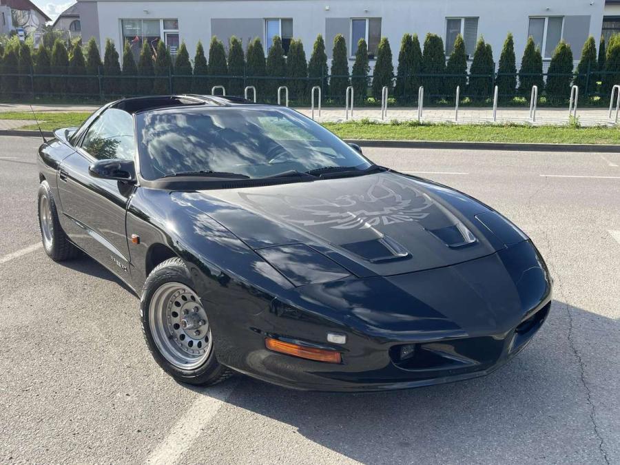 Melns Pontiac Firebird 1994 Viļņa, ar dzinēja tilpumu 3.35 L un nobraukumu 235 tūkst. km par 6299 €, foto 10 vietnē AUTOMOTO.COM.LV