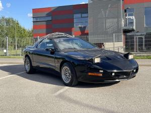 Melns Pontiac Firebird 1994 Viļņa, ar dzinēja tilpumu 3.35 L un nobraukumu 235 tūkst. km par 6299 €, foto 13 vietnē AUTOMOTO.COM.LV