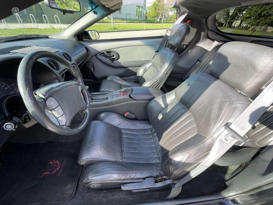 Melns Pontiac Firebird 1994 Viļņa, ar dzinēja tilpumu 3.35 L un nobraukumu 235 tūkst. km par 6299 €, foto 18 vietnē AUTOMOTO.COM.LV