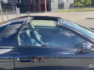 Melns Pontiac Firebird 1994 Viļņa, ar dzinēja tilpumu 3.35 L un nobraukumu 235 tūkst. km par 6299 €, foto 27 vietnē AUTOMOTO.COM.LV