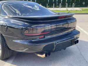 Melns Pontiac Firebird 1994 Viļņa, ar dzinēja tilpumu 3.35 L un nobraukumu 235 tūkst. km par 6299 €, foto 28 vietnē AUTOMOTO.COM.LV
