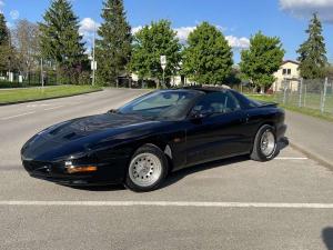 Melns Pontiac Firebird 1994 Viļņa, ar dzinēja tilpumu 3.35 L un nobraukumu 235 tūkst. km par 6299 €, foto 30 vietnē AUTOMOTO.COM.LV