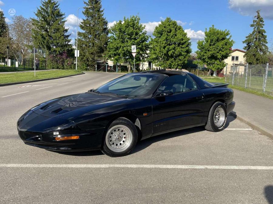 Melns Pontiac Firebird 1994 Viļņa, ar dzinēja tilpumu 3.35 L un nobraukumu 235 tūkst. km par 6299 €, foto 30 vietnē AUTOMOTO.COM.LV