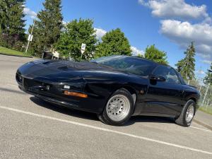 Melns Pontiac Firebird 1994 Viļņa, ar dzinēja tilpumu 3.35 L un nobraukumu 235 tūkst. km par 6299 €, foto 31 vietnē AUTOMOTO.COM.LV