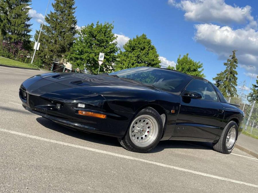 Melns Pontiac Firebird 1994 Viļņa, ar dzinēja tilpumu 3.35 L un nobraukumu 235 tūkst. km par 6299 €, foto 31 vietnē AUTOMOTO.COM.LV