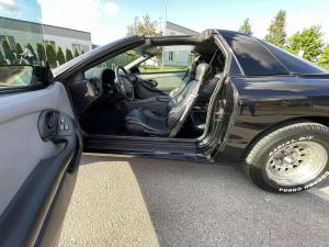 Black Pontiac Firebird 1994 in Vilnius, with an engine capacity of 3.35 L and mileage of 235 thousand km for 5800 €, photo 12 on AUTOMOTO.COM.LV