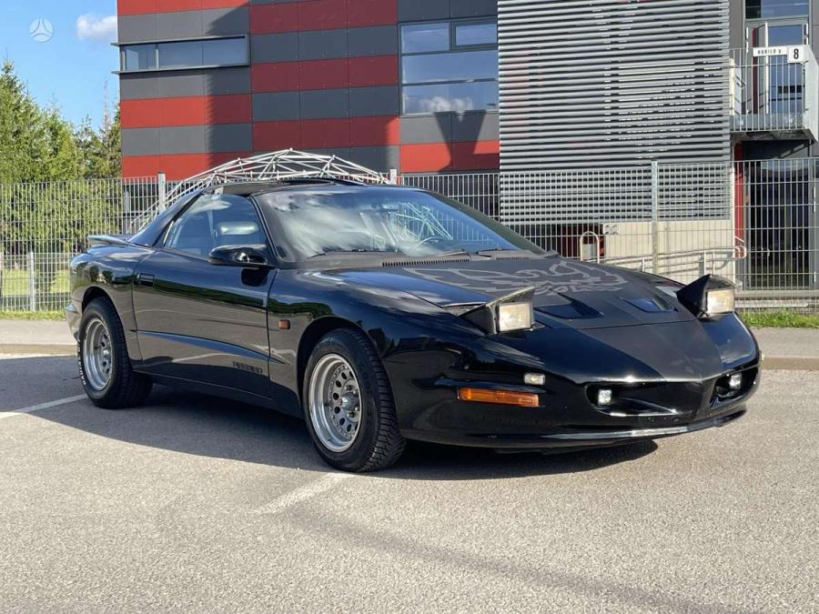 Black Pontiac Firebird 1994 in Vilnius, with an engine capacity of 3.35 L and mileage of 235 thousand km for 5800 €, photo 26 on AUTOMOTO.COM.LV