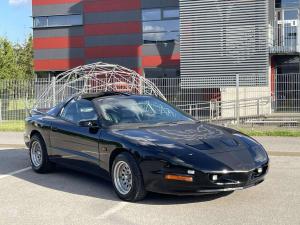 Black Pontiac Firebird 1994 in Vilnius, with an engine capacity of 3.35 L and mileage of 235 thousand km for 5800 €, photo 28 on AUTOMOTO.COM.LV