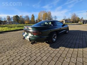 Zaļš Pontiac Firebird 1997 Rīga, ar dzinēja tilpumu 3.80 L un nobraukumu 175 tūkst. km par 4000 €, foto 5 vietnē AUTOMOTO.COM.LV