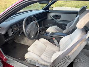 Red Pontiac Firebird 1991 in Tallinn, with an engine capacity of 5.70 L and mileage of 147 thousand km for 15900 €, photo 7 on AUTOMOTO.COM.LV