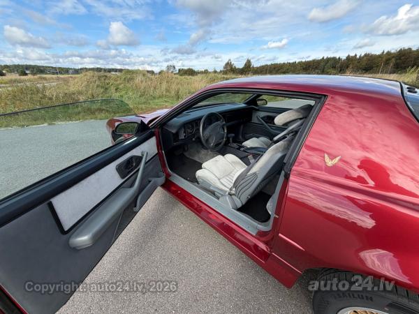 Sarkans Pontiac Firebird 1991 Tallina, ar dzinēja tilpumu 5.70 L un nobraukumu 147 tūkst. km par 15900 €, foto 6 vietnē AUTOMOTO.COM.LV