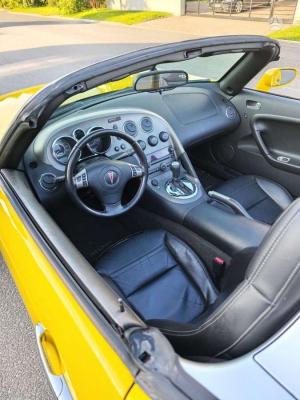 Dzeltens Pontiac Solstice 2008 Panevēža, ar dzinēja tilpumu 2.00 L un nobraukumu 55 tūkst. km par 8800 €, foto 25 vietnē AUTOMOTO.COM.LV