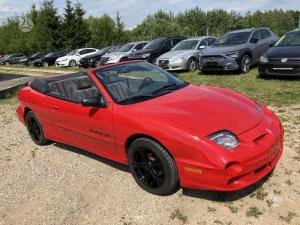 Red Pontiac Sunfire 2000 in Prienai, with an engine capacity of 2.39 L and mileage of 128 thousand km for 3999 €, photo 9 on AUTOMOTO.COM.LV
