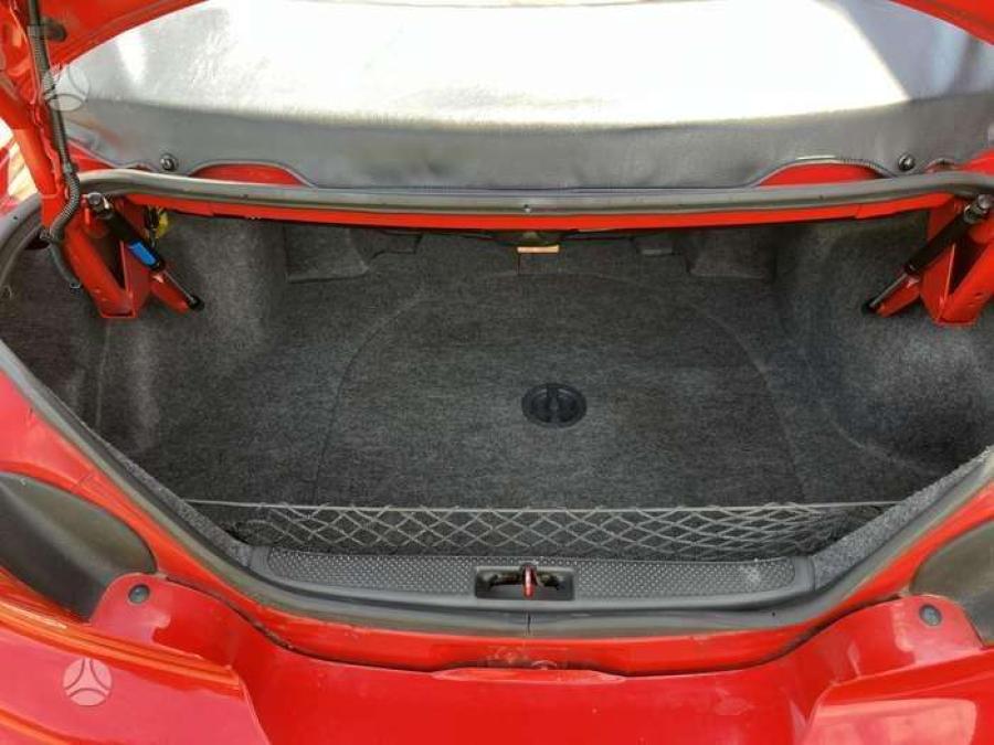 Red Pontiac Sunfire 2000 in Prienai, with an engine capacity of 2.39 L and mileage of 128 thousand km for 3999 €, photo 18 on AUTOMOTO.COM.LV