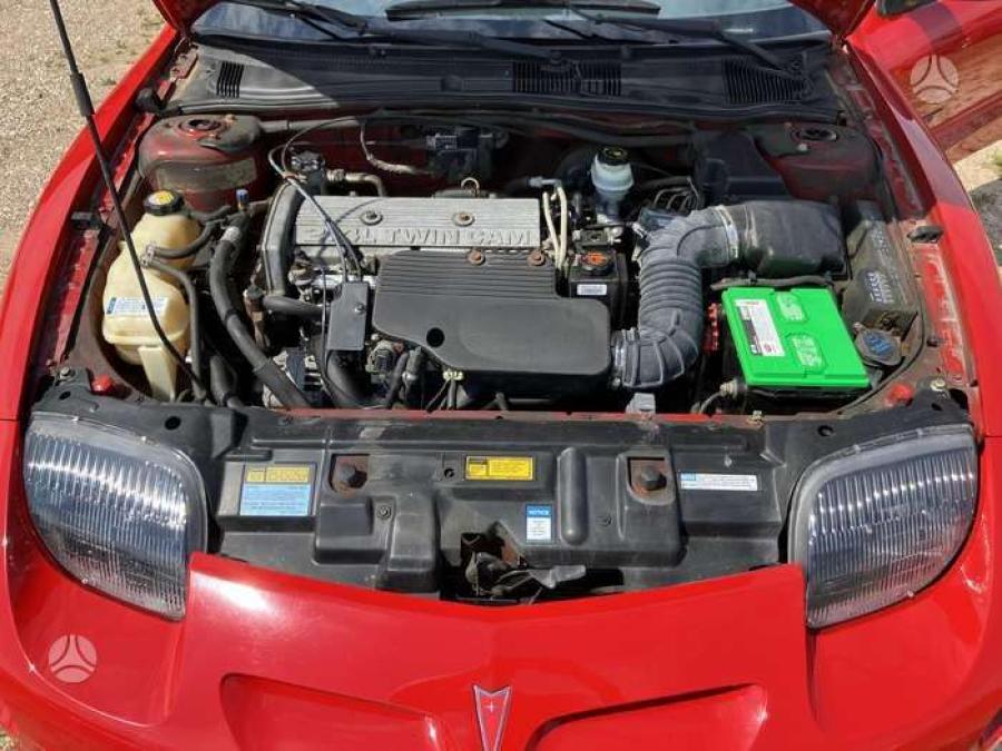 Red Pontiac Sunfire 2000 in Prienai, with an engine capacity of 2.39 L and mileage of 128 thousand km for 3999 €, photo 20 on AUTOMOTO.COM.LV