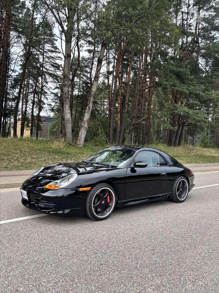 Black Porsche 911 1999 in Vilnius, with an engine capacity of 3.39 L and mileage of 116 thousand km for 24999 €, photo 3 on AUTOMOTO.COM.LV