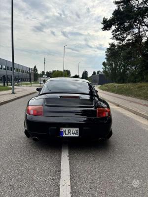 Black Porsche 911 1999 in Vilnius, with an engine capacity of 3.39 L and mileage of 116 thousand km for 24999 €, photo 7 on AUTOMOTO.COM.LV