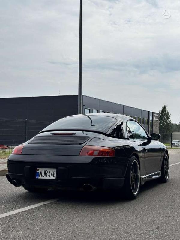 Black Porsche 911 1999 in Vilnius, with an engine capacity of 3.39 L and mileage of 116 thousand km for 24999 €, photo 7 on AUTOMOTO.COM.LV