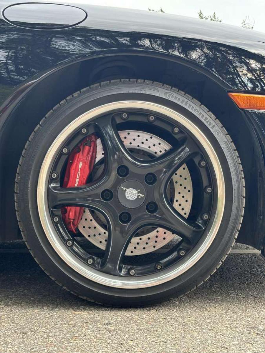 Black Porsche 911 1999 in Vilnius, with an engine capacity of 3.39 L and mileage of 116 thousand km for 24999 €, photo 10 on AUTOMOTO.COM.LV