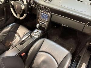 Black Porsche 911 2008 in Vilnius, with an engine capacity of 3.60 L and mileage of 93 thousand km for 72490 €, photo 18 on AUTOMOTO.COM.LV