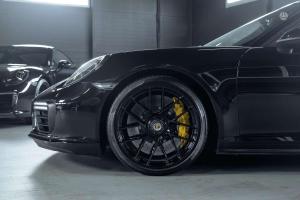 Black Porsche 911 2016 in Vilnius, with an engine capacity of 3.80 L and mileage of 125 thousand km for 104500 €, photo 9 on AUTOMOTO.COM.LV