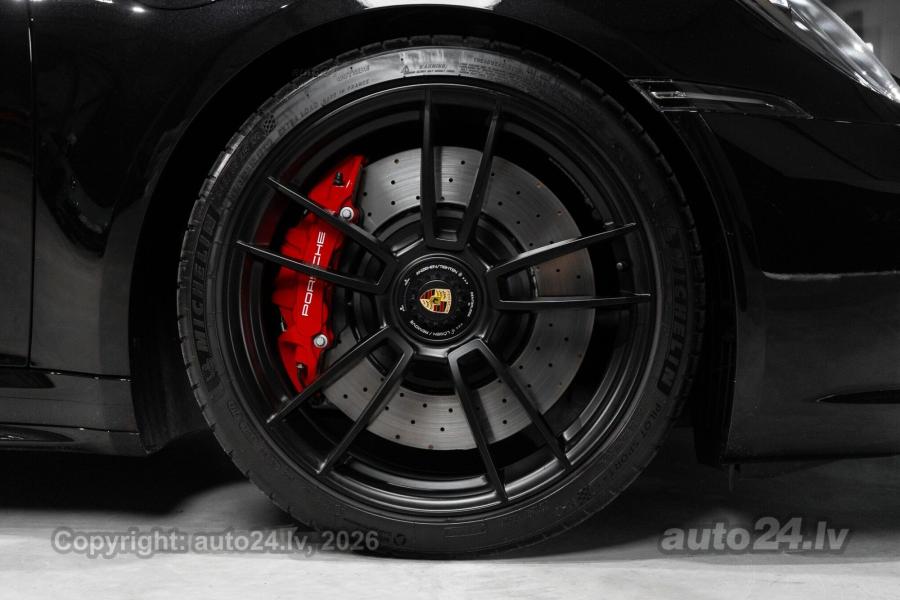 Melns Porsche 911 2024 Rīga, ar dzinēja tilpumu 3.00 L un nobraukumu 4 tūkst. km par 169000 €, foto 8 vietnē AUTOMOTO.COM.LV