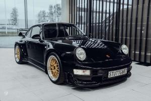 Black Porsche 911 1991 in Riga, with an engine capacity of 3.60 L and mileage of 92 thousand km for 95000 €, photo  on AUTOMOTO.COM.LV