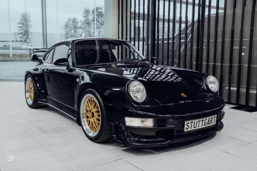 Black Porsche 911 1991 in Riga, with an engine capacity of 3.60 L and mileage of 92 thousand km for 95000 €, photo 1 on AUTOMOTO.COM.LV