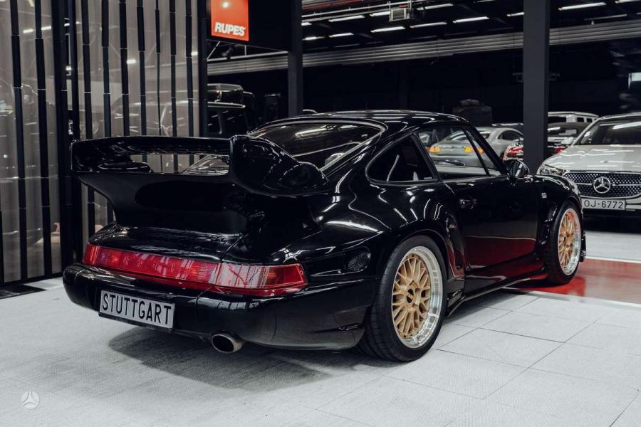 Black Porsche 911 1991 in Riga, with an engine capacity of 3.60 L and mileage of 92 thousand km for 95000 €, photo 7 on AUTOMOTO.COM.LV