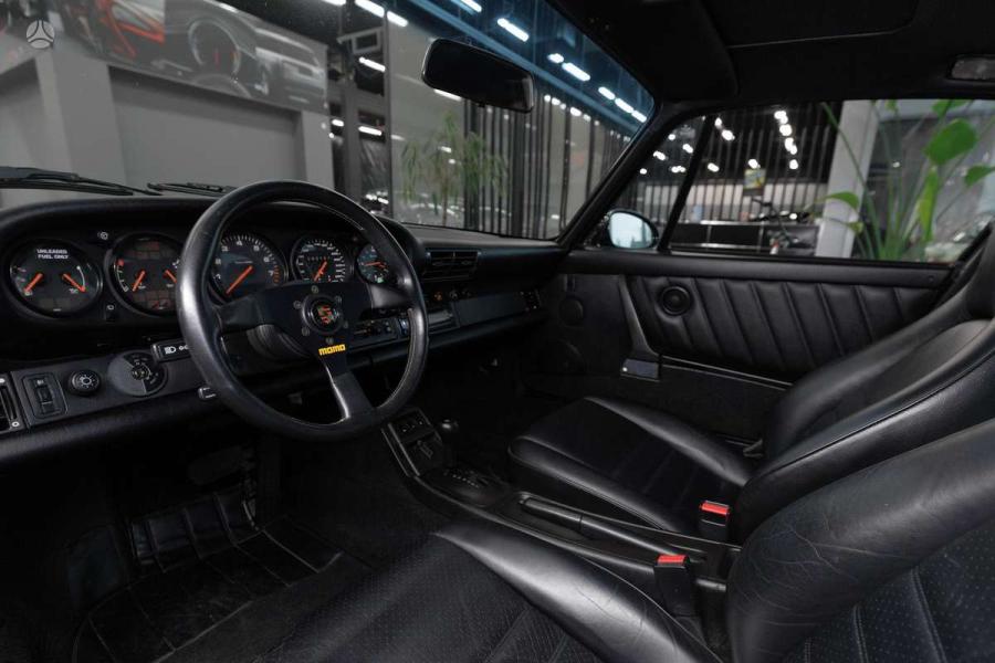 Black Porsche 911 1991 in Riga, with an engine capacity of 3.60 L and mileage of 92 thousand km for 95000 €, photo 12 on AUTOMOTO.COM.LV