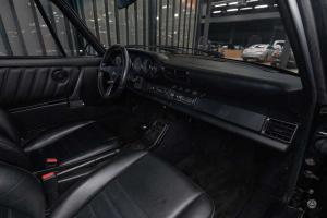 Black Porsche 911 1991 in Riga, with an engine capacity of 3.60 L and mileage of 92 thousand km for 95000 €, photo 16 on AUTOMOTO.COM.LV