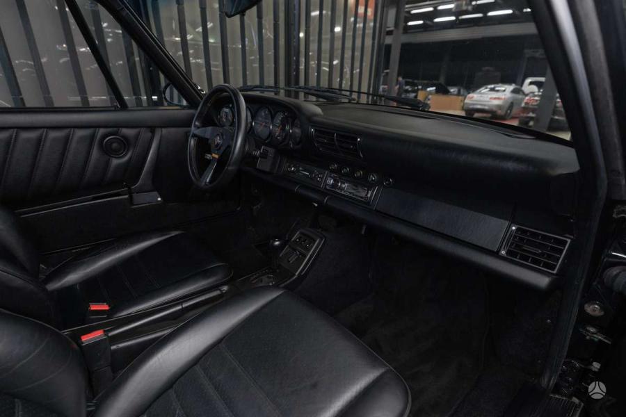 Black Porsche 911 1991 in Riga, with an engine capacity of 3.60 L and mileage of 92 thousand km for 95000 €, photo 16 on AUTOMOTO.COM.LV