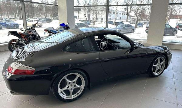 Black Porsche 911 1999 in Marijampole, with an engine capacity of 3.39 L and mileage of 106 thousand km for 29999 €, photo 7 on AUTOMOTO.COM.LV