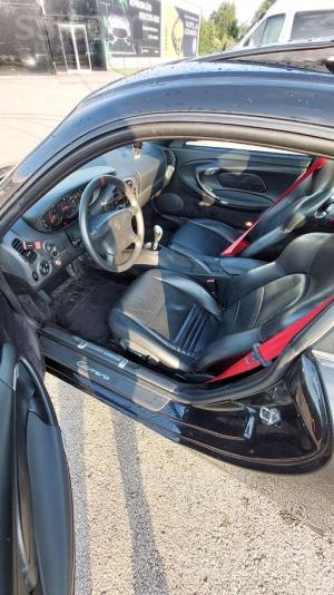 Melns Porsche 911 1999 Rīga, ar dzinēja tilpumu 3.40 L un nobraukumu 188 tūkst. km par 42990 €, foto 10 vietnē AUTOMOTO.COM.LV