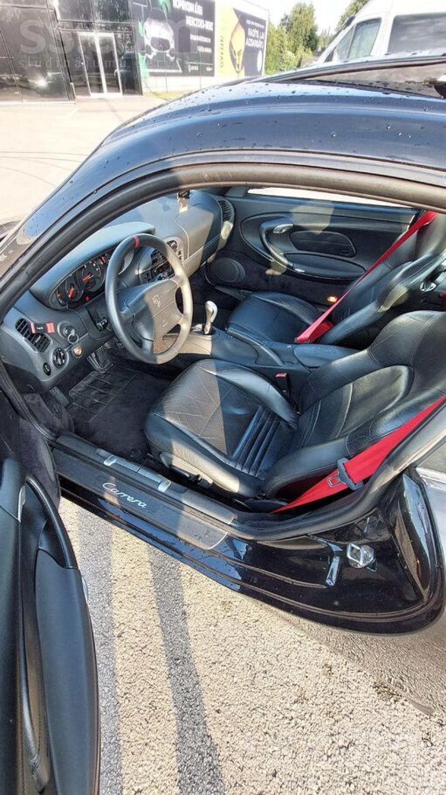 Melns Porsche 911 1999 Rīga, ar dzinēja tilpumu 3.40 L un nobraukumu 188 tūkst. km par 42990 €, foto 10 vietnē AUTOMOTO.COM.LV